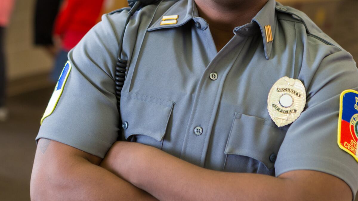 Students smother beloved security guard with hugs on last day of school
